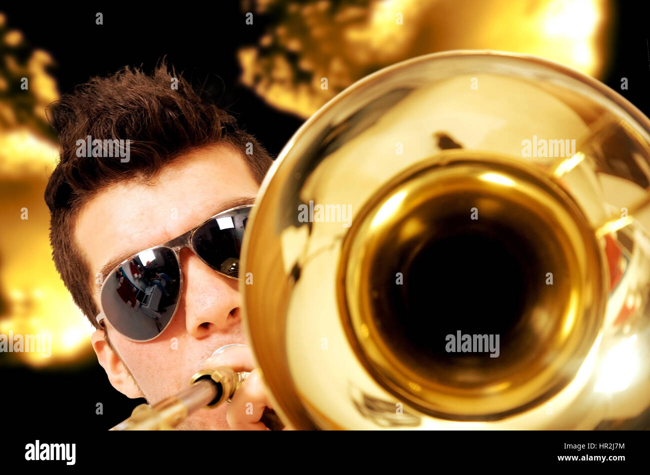 man playing the saxophone at a party Stock Photo - Alamy