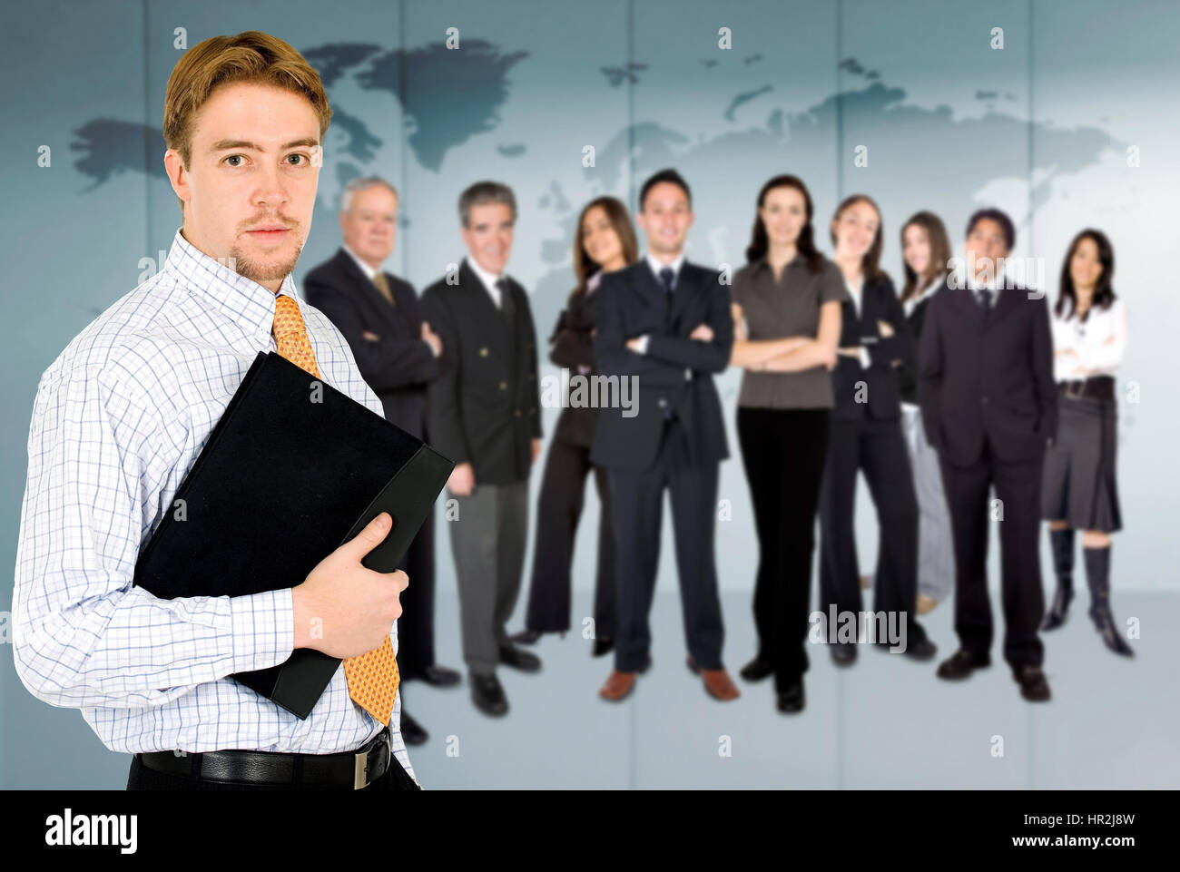 businessman with business team in an office background with the ...