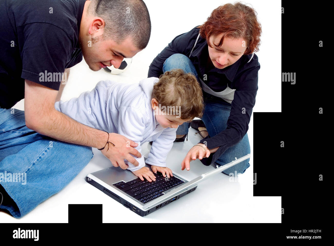 family on a laptop computer isolated over a white background Stock ...