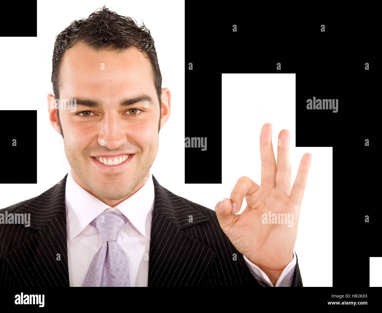 business man smiling doing the okay sign over a white background Stock ...