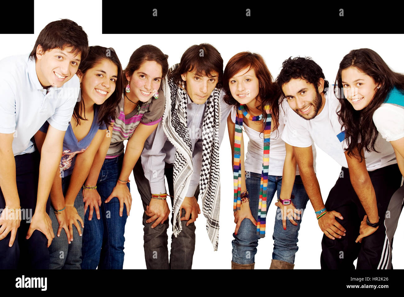 group of happy friends smiling for a portrait isolated over a white ...