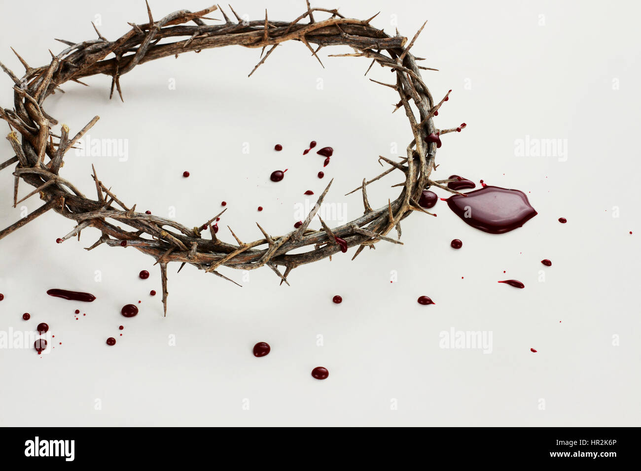 Crown of thorns with blood over white background Stock Photo - Alamy