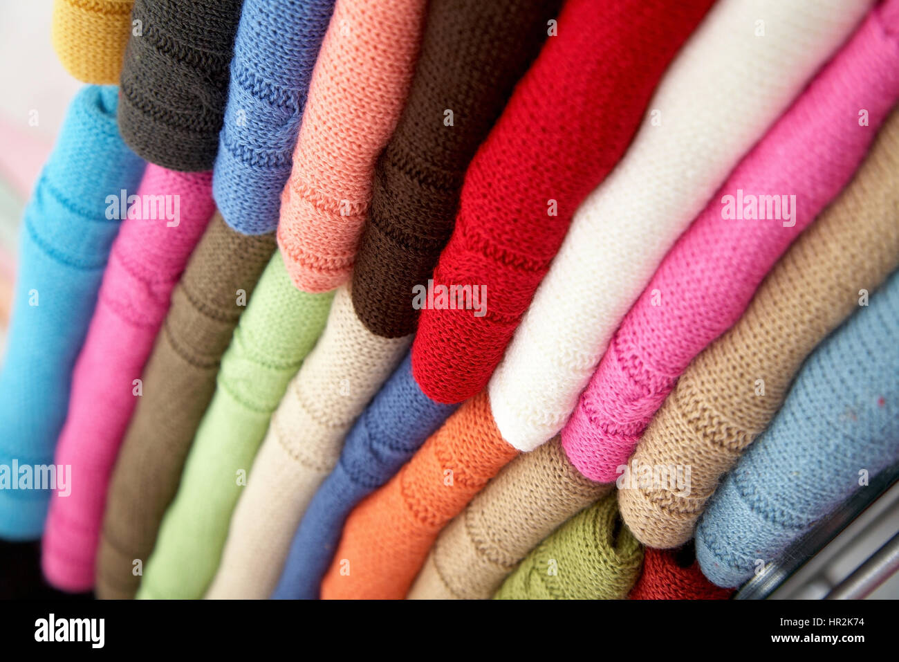 Colourful clothes stacked in retail hi-res stock photography and images ...