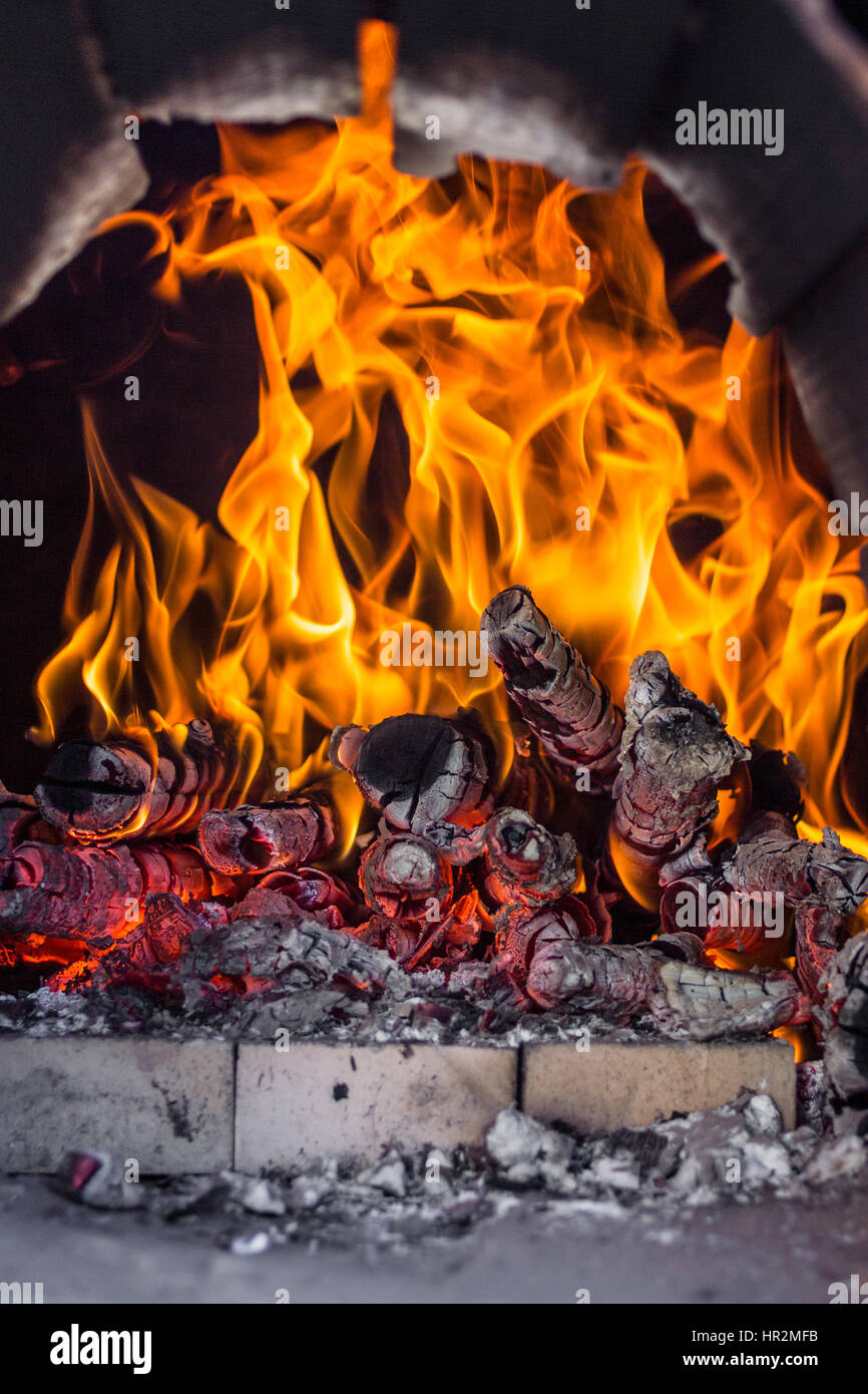 Fire in a bread oven Stock Photo - Alamy