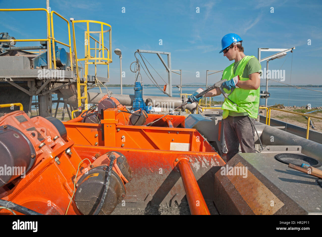 The young worker at cleaning - industry Stock Photo - Alamy