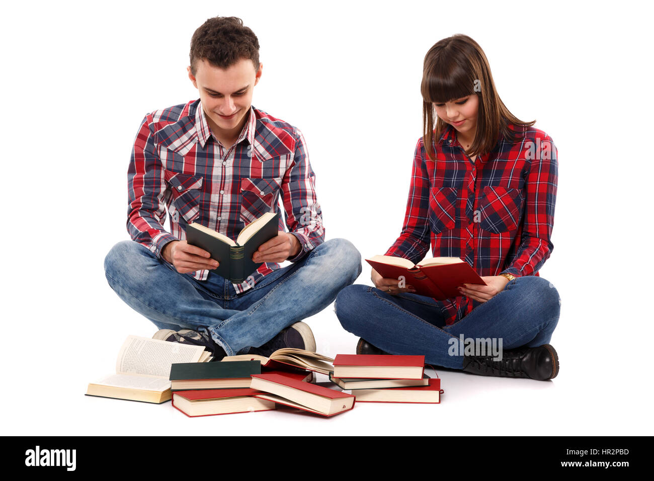 Teenage couple studying together, isolated on white background Stock ...