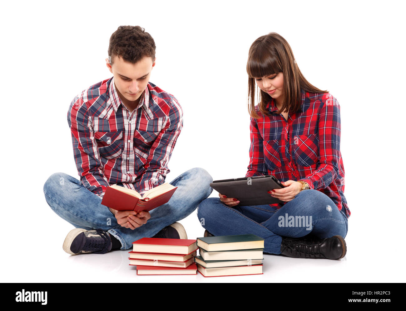 Teenage couple studying together, isolated on white background Stock ...