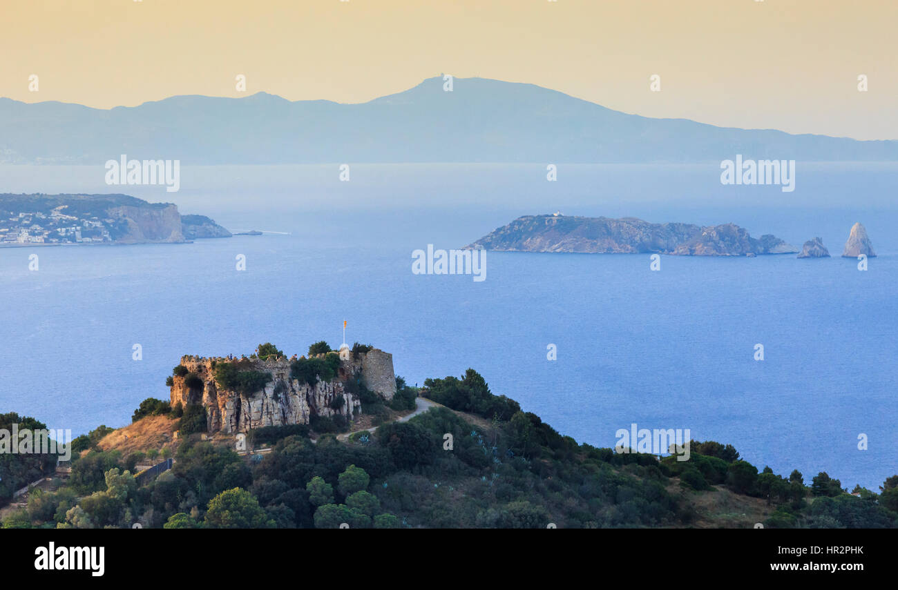 Evening view of Begur castle with bay and Illes Medes in the background ...
