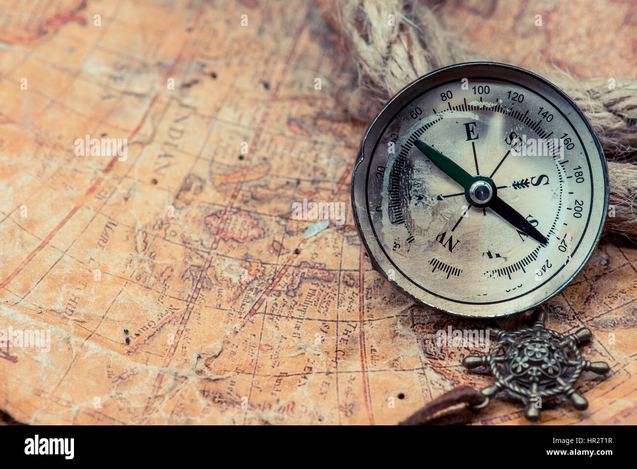 Columbus day and world map with compass Stock Photo - Alamy