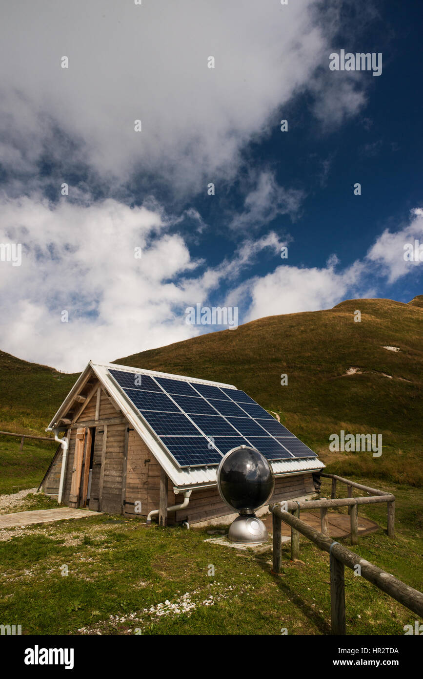 Solar panels on a mountain hut, electrical energy production and ...