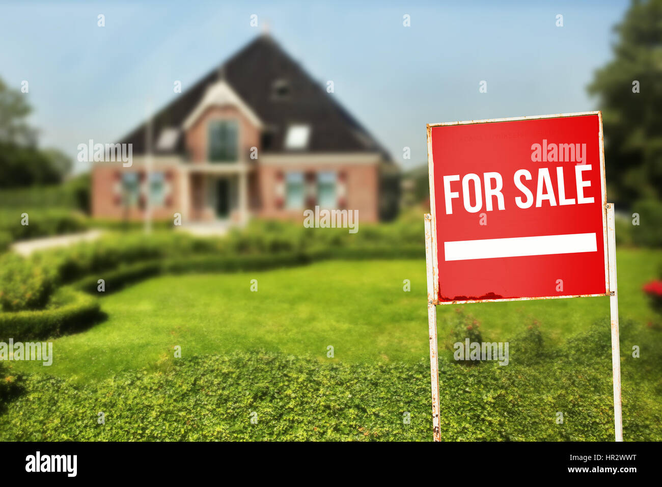 Home For Sale Real Estate Sign in Front of New House Stock Photo - Alamy