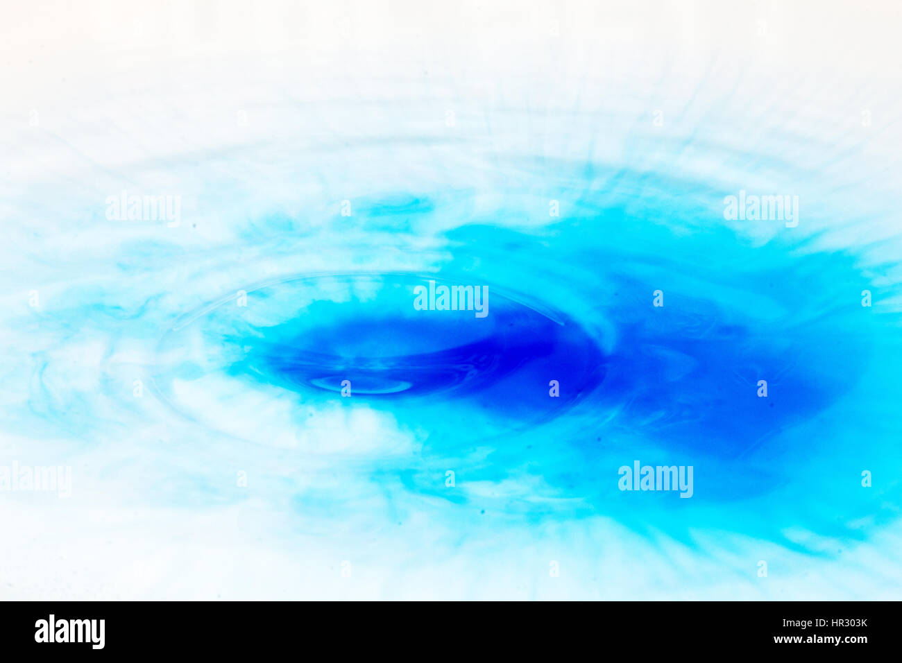 Colorful paint drop splashing on black a background Stock Photo - Alamy