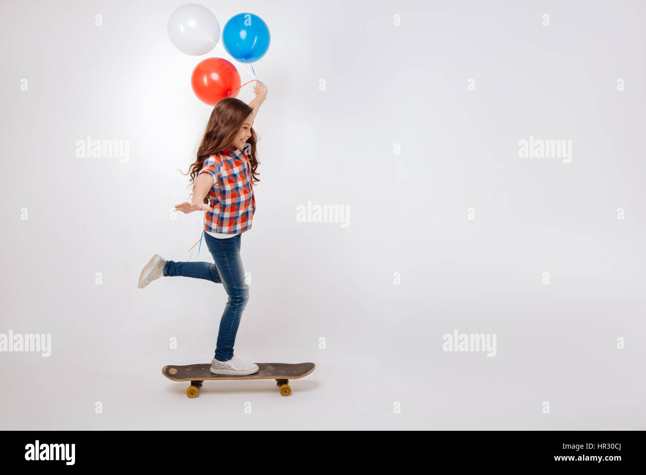 Practicing new skills. Skillful gifted artistic child expressing joy ...