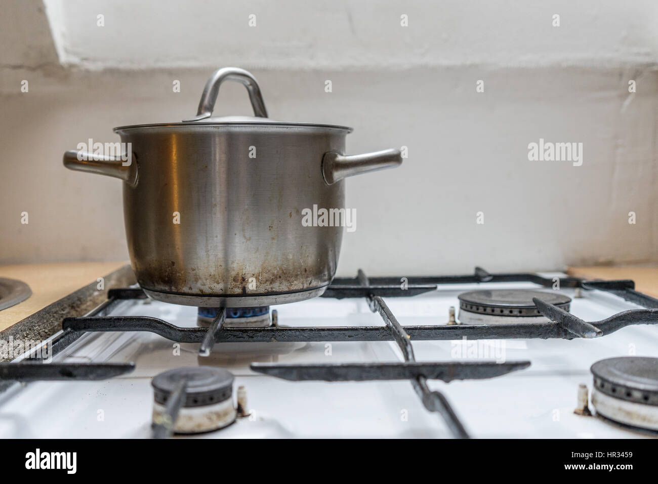 Pot on a gas cooker Stock Photo - Alamy