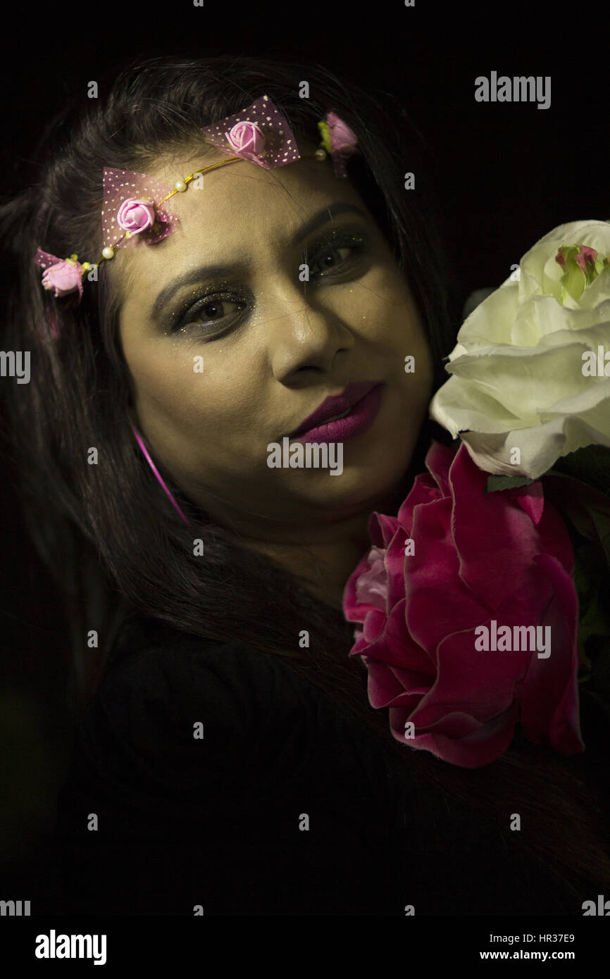 Indian woman flowers hair hi-res stock photography and images - Alamy