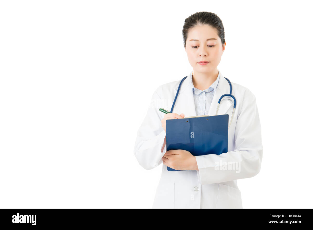 asian doctor holding pen writing medical case on clipboard. isolated on ...