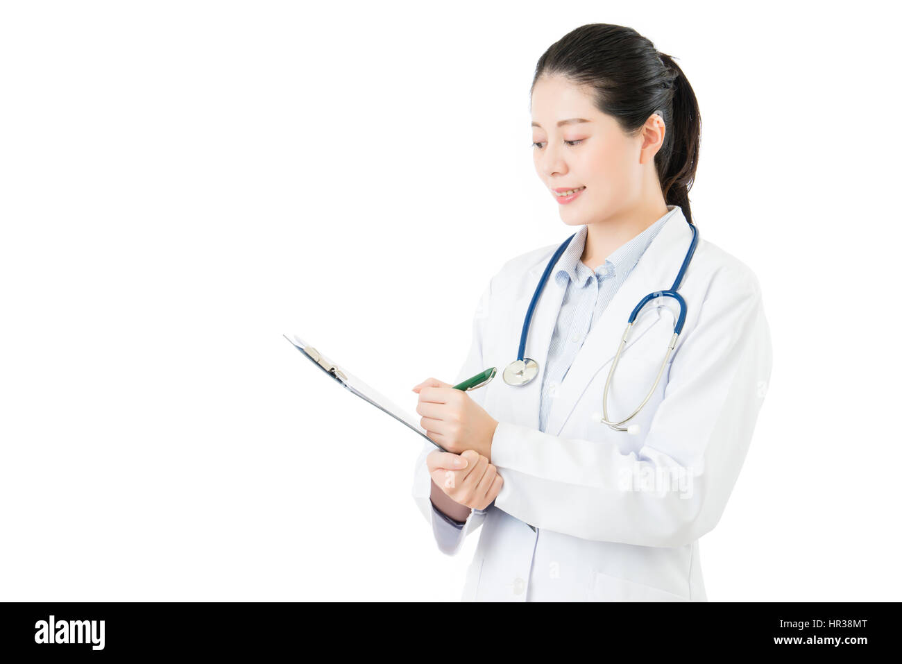 asian doctor holding pen writing medical case on clipboard. isolated on ...
