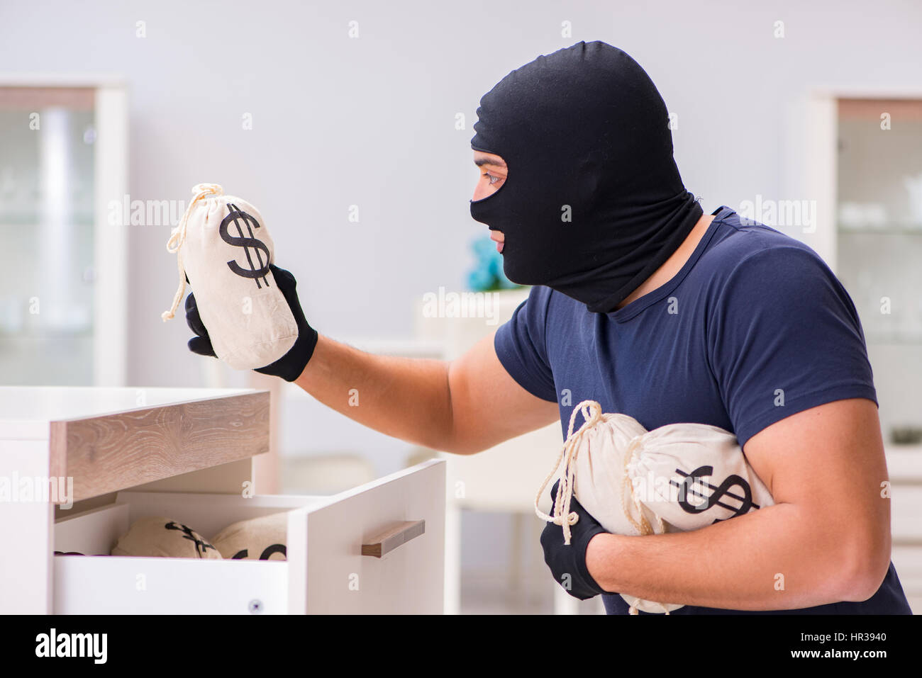 Wearing jewellery stolen hi-res stock photography and images - Alamy