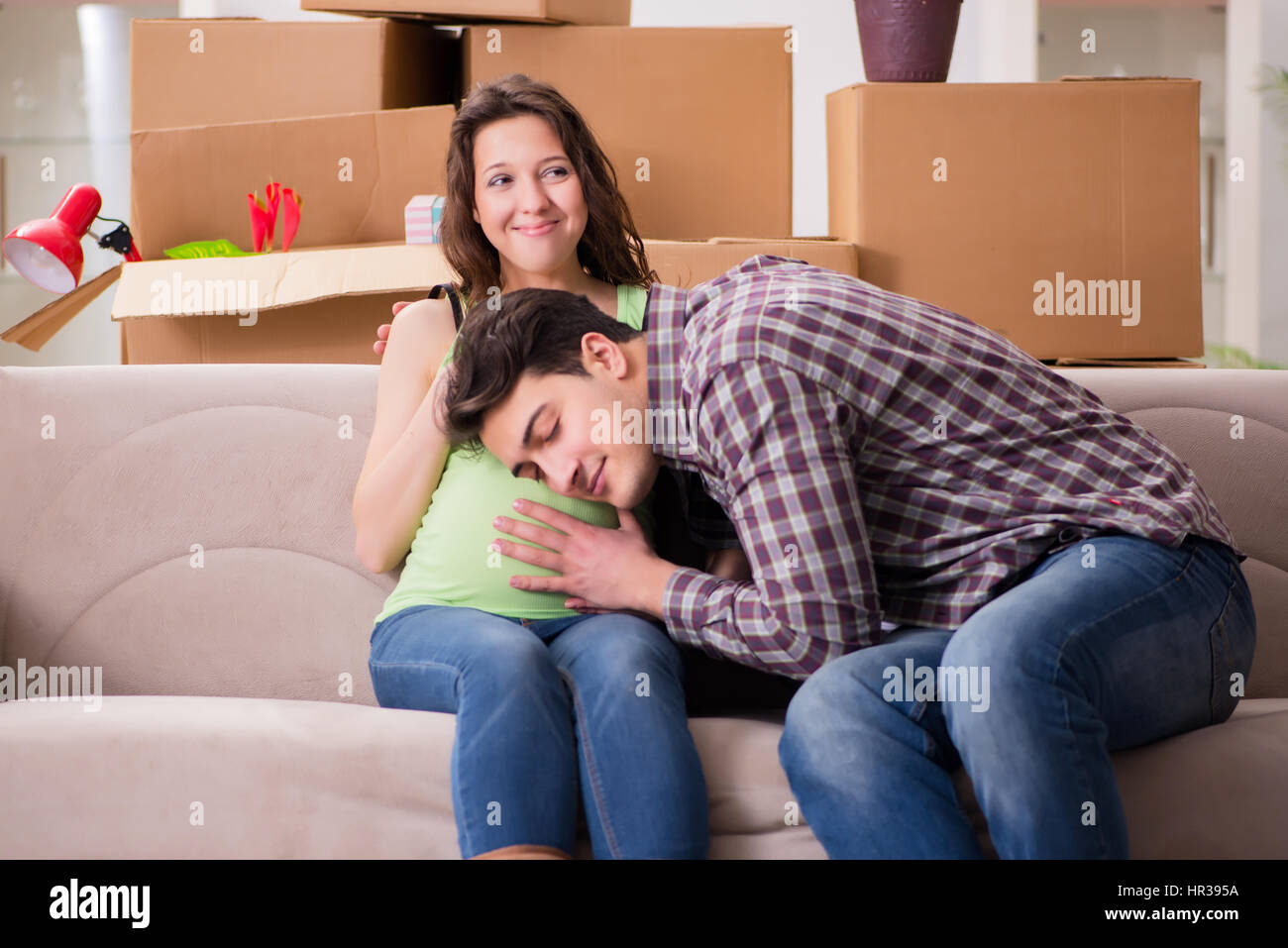Young couple of man and pregnant wife expecting baby Stock Photo - Alamy