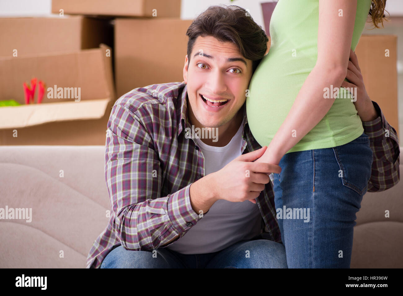 Young couple of man and pregnant wife expecting baby Stock Photo - Alamy