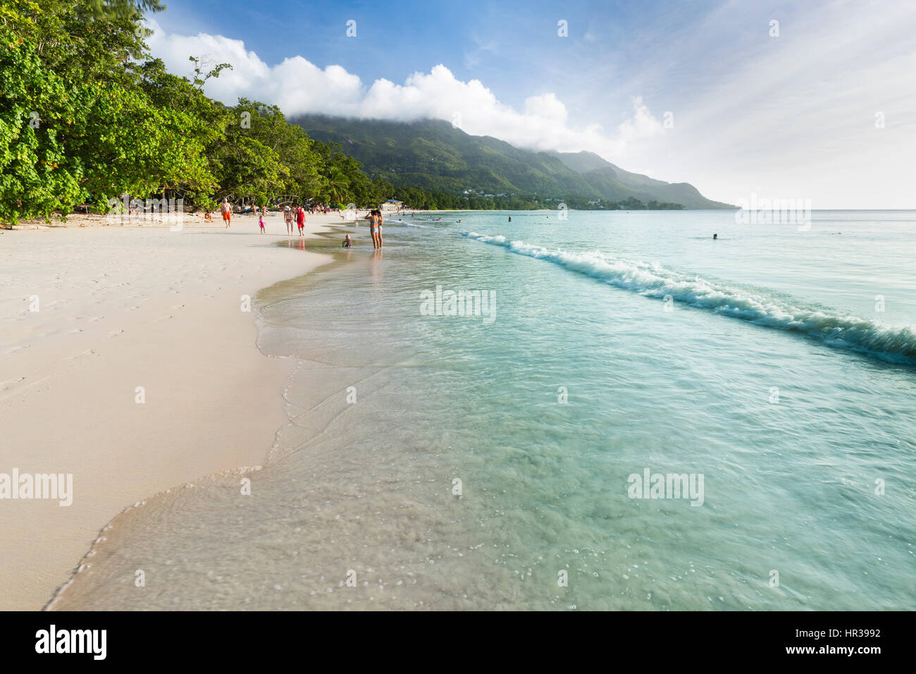 MAHE - AUGUST 08: Tourists and locals at Beau Vallon Beach in the west ...