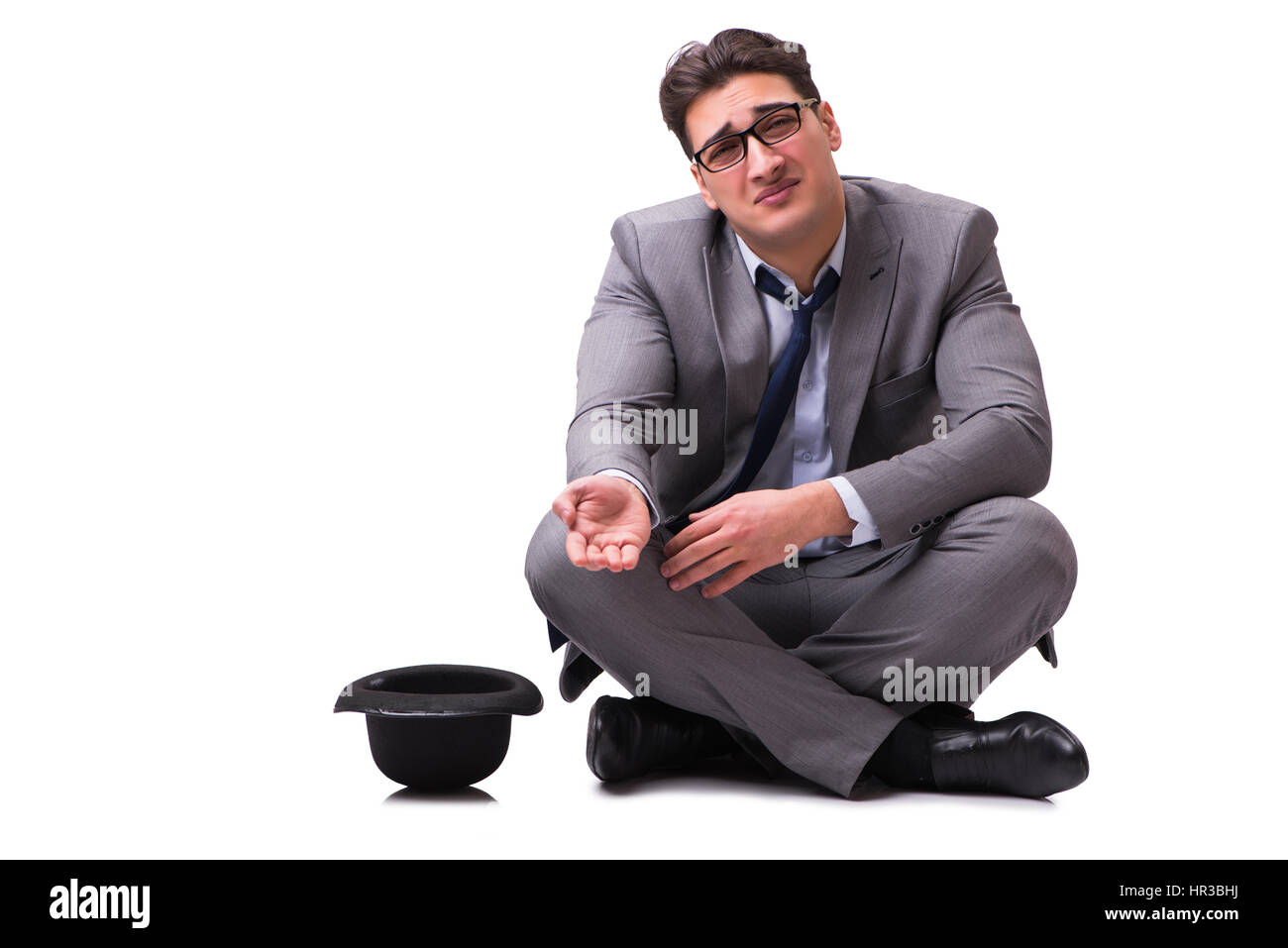 Bankrupt businessman isolated on white background Stock Photo - Alamy
