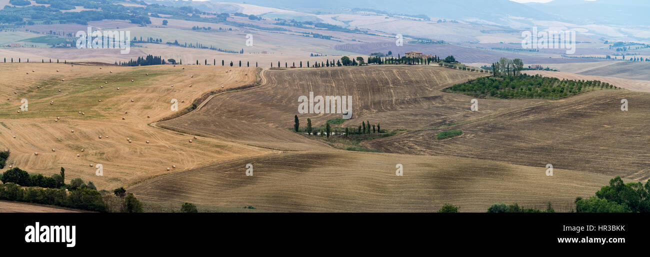 Scenic Tuscany landscape with rolling hills and valleys in golden ...