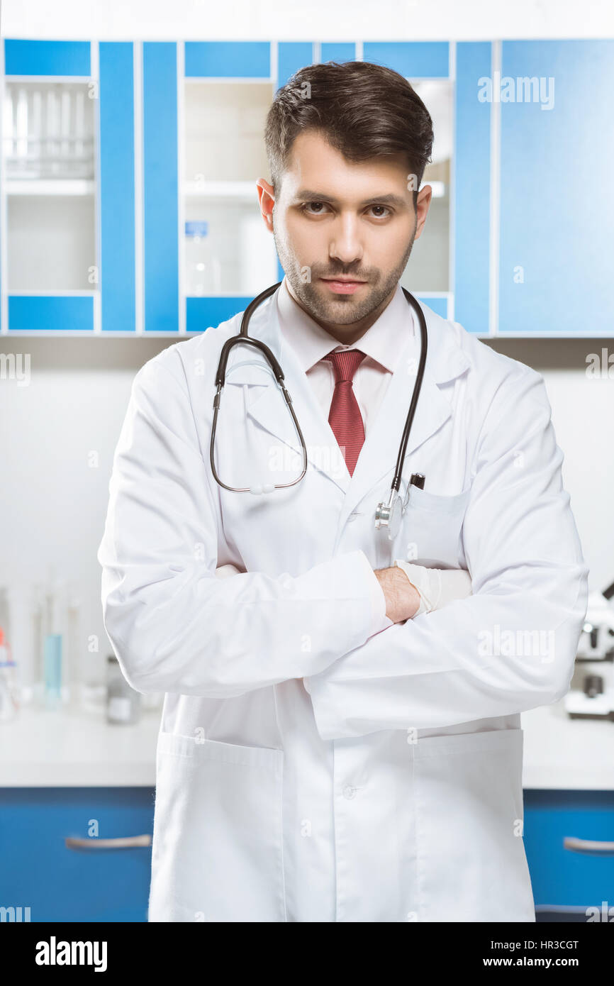 portrait of serious doctor in medical uniform in lab Stock Photo - Alamy