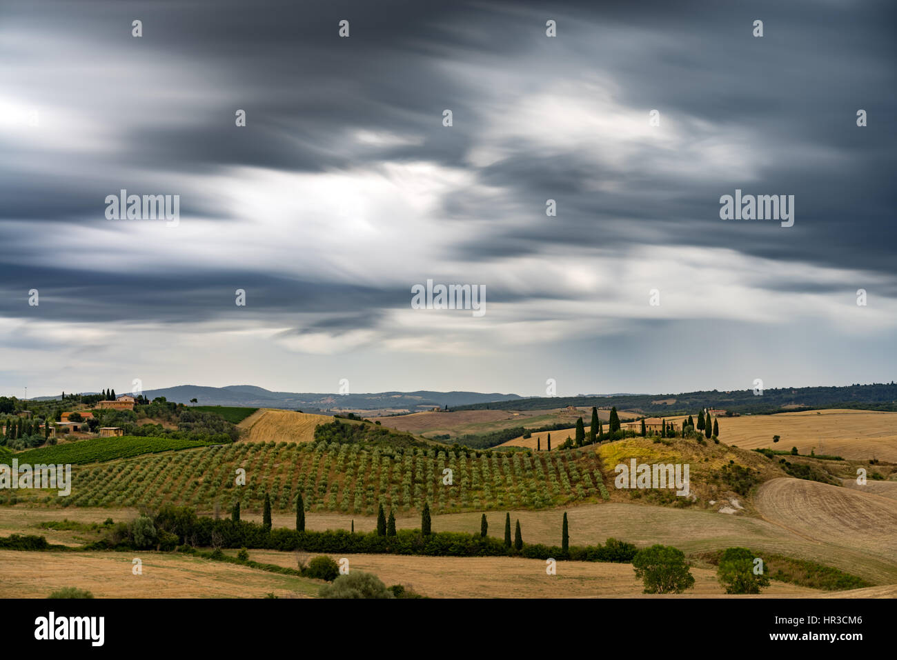 Scenic Tuscany landscape with rolling hills and valleys in golden ...