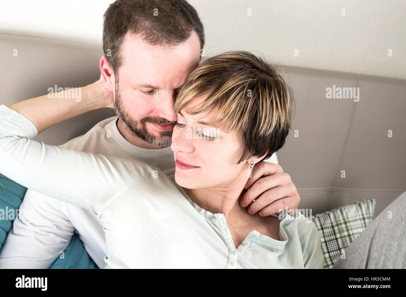 Couple in love, indoor cropped portrait. Filtered shot Stock Photo - Alamy