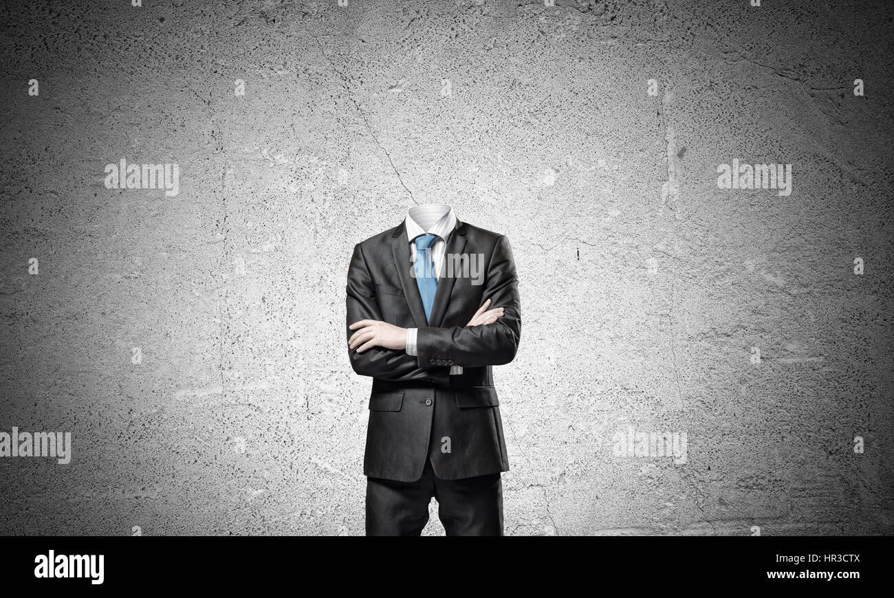 Headless businessman with arms crossed on chest in black suit Stock ...