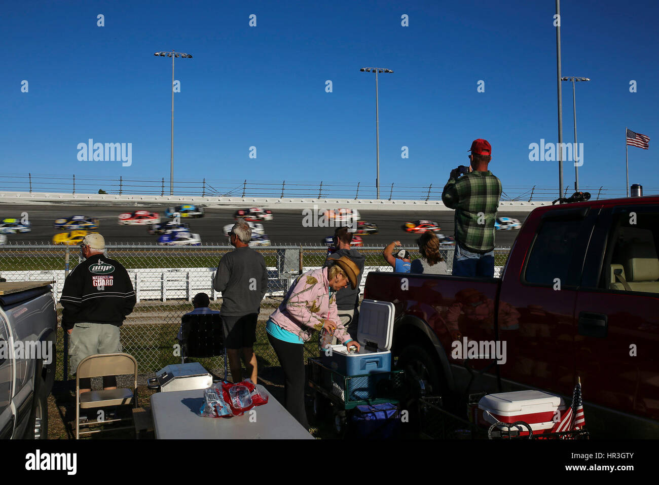 Florida, USA. 26th Feb, 2017. CHARLIE KAIJO | Times.NASCAR fans watch ...