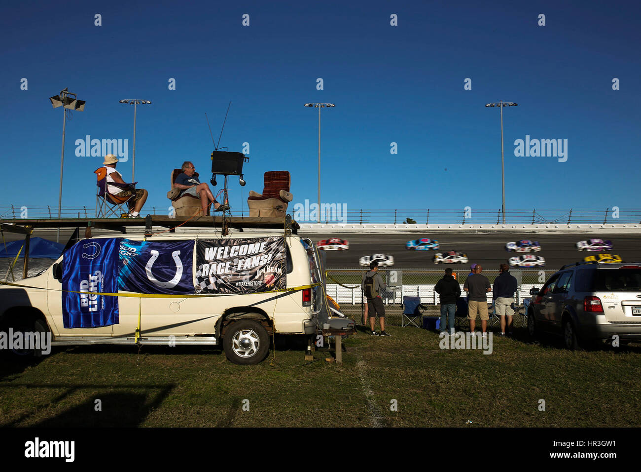 Florida, USA. 26th Feb, 2017. CHARLIE KAIJO | Times.NASCAR fans watch ...