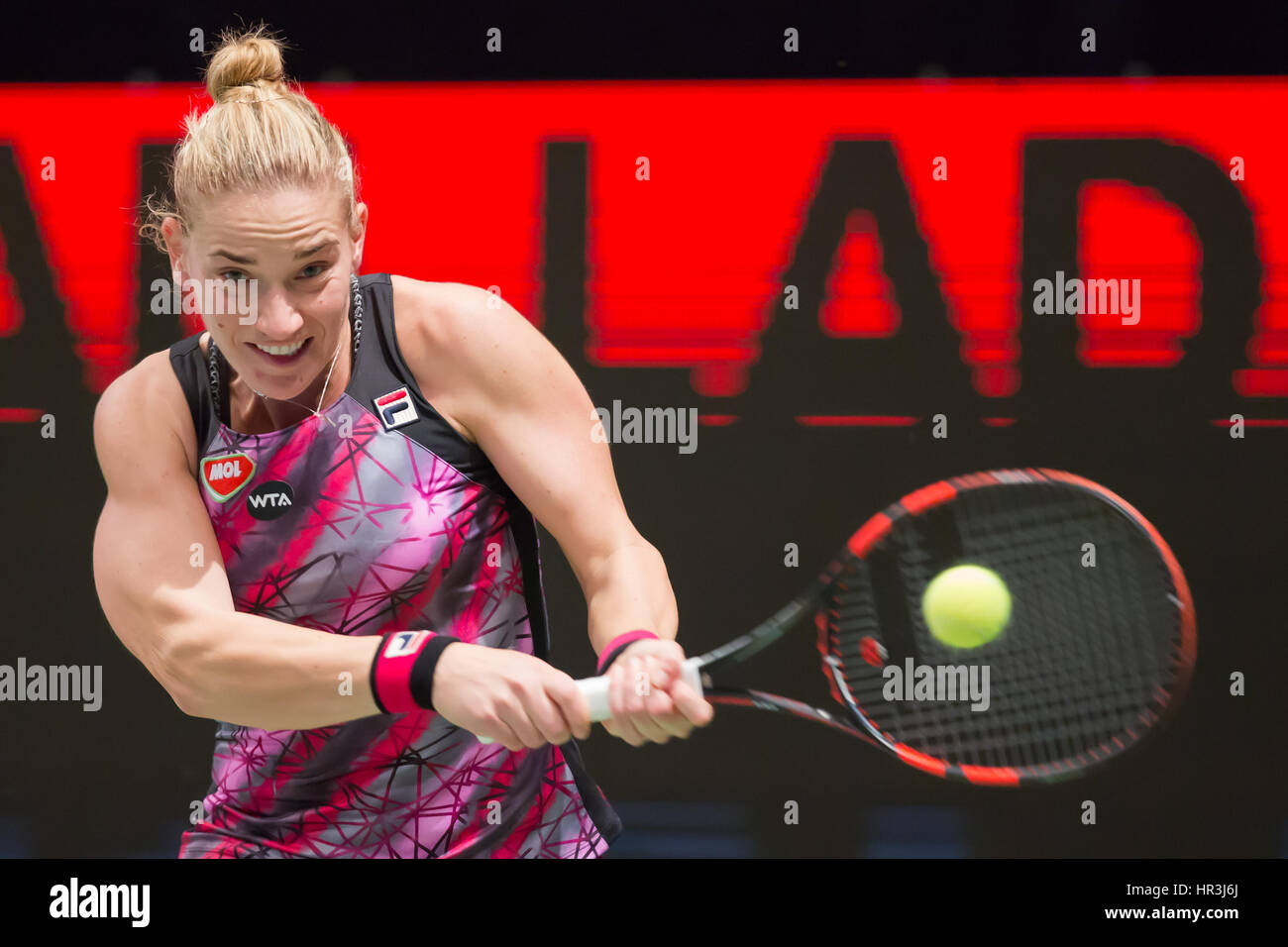 Budapest. 26th Feb, 2017. Hungary's Timea Babos hits a return during ...