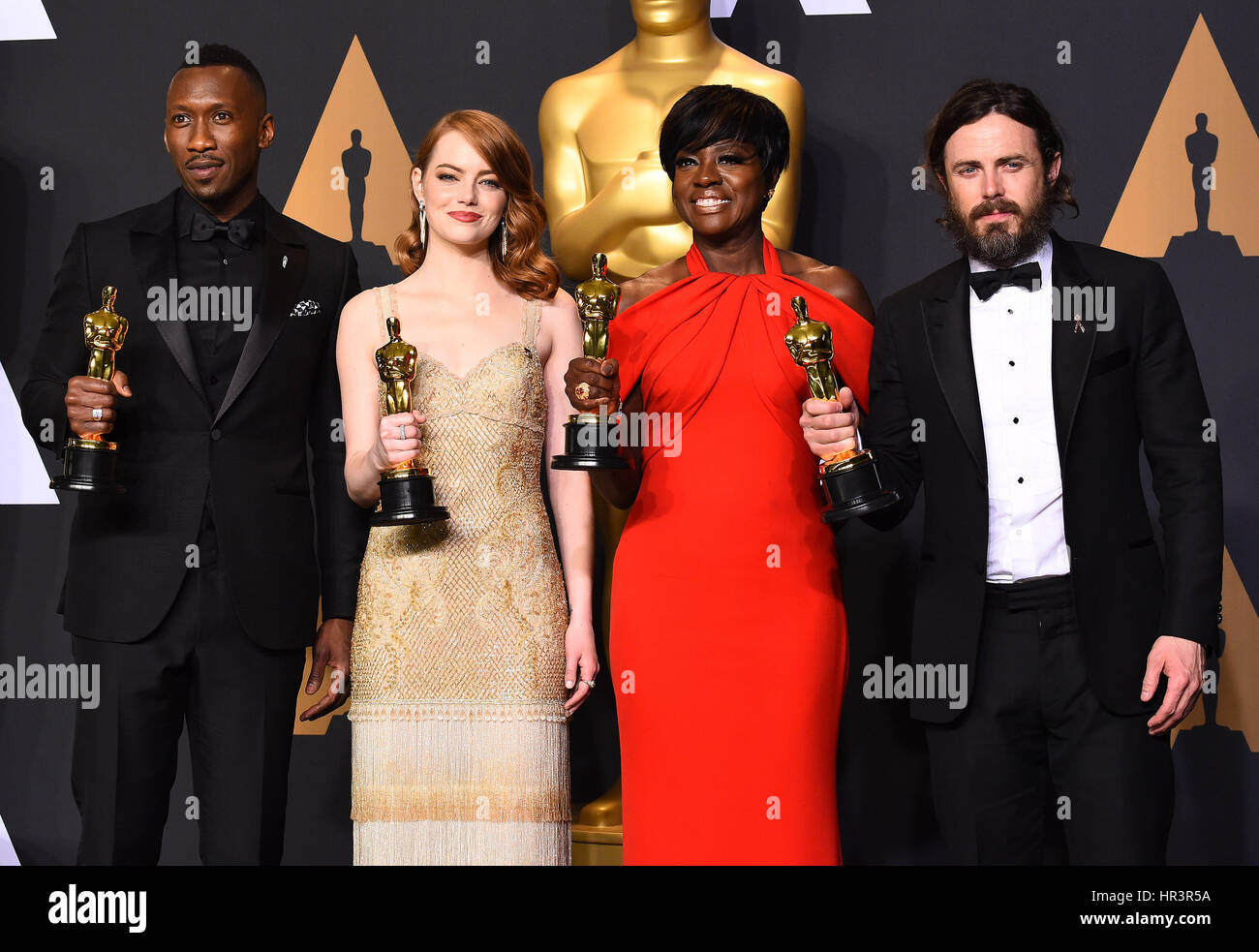Hollywood, California, USA. 26th Feb, 2017. Mahershala Ali, Emma Stone ...