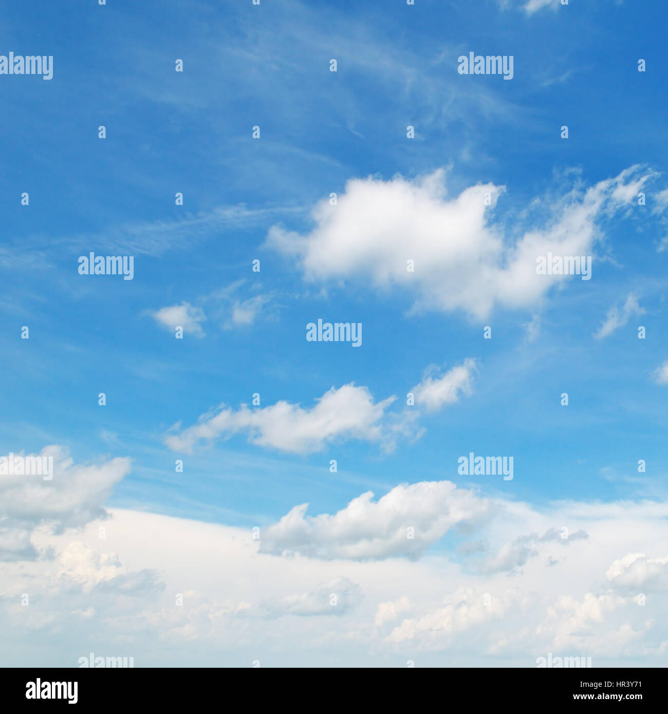 white clouds on a blue sky background Stock Photo - Alamy