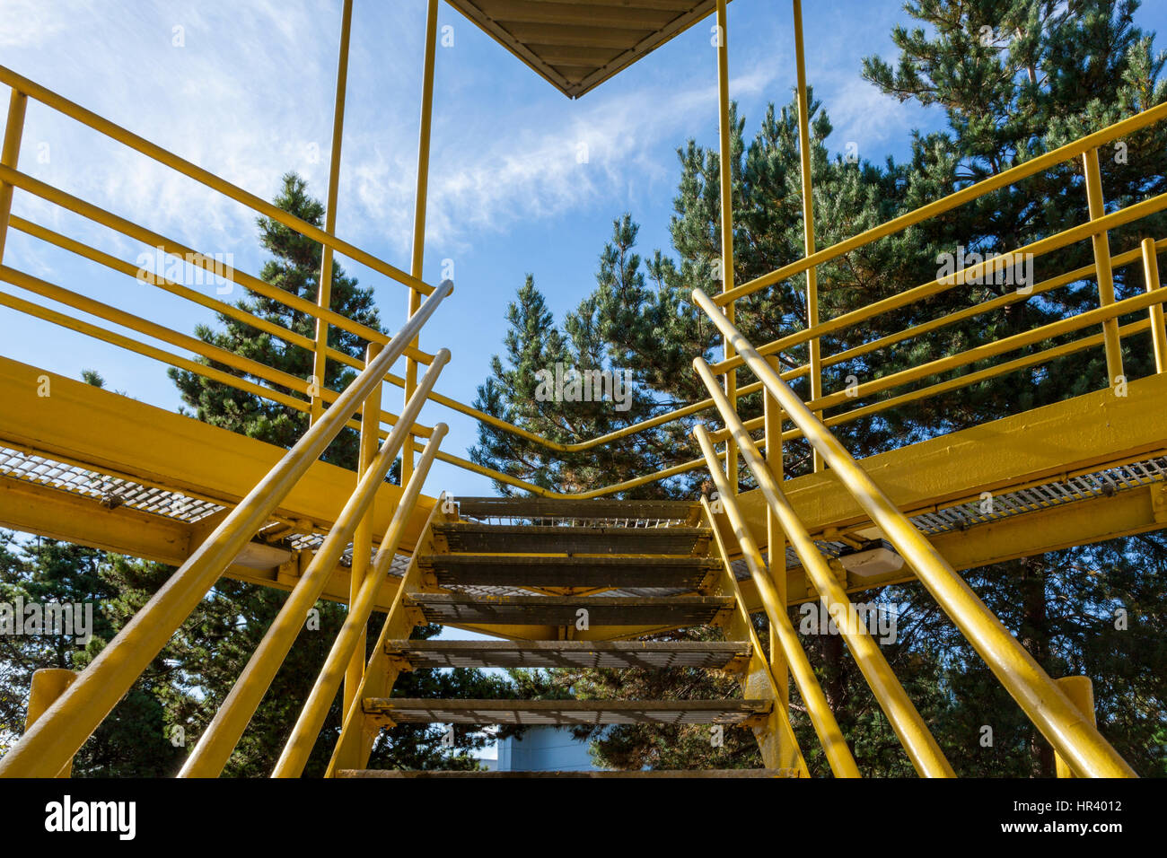 Yellow metal steps on the exterior of a building, UK Stock Photo - Alamy