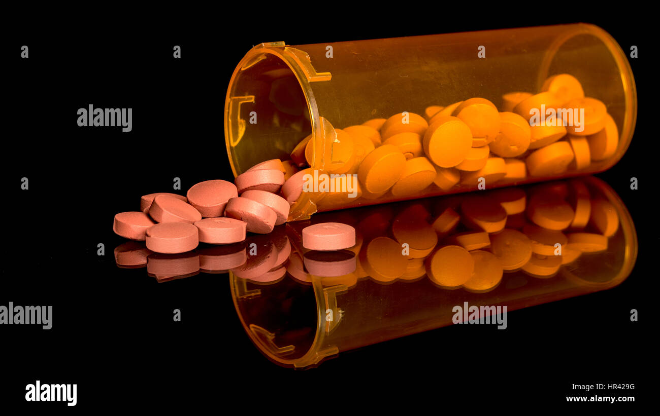 Bottle colored pills hi-res stock photography and images - Alamy