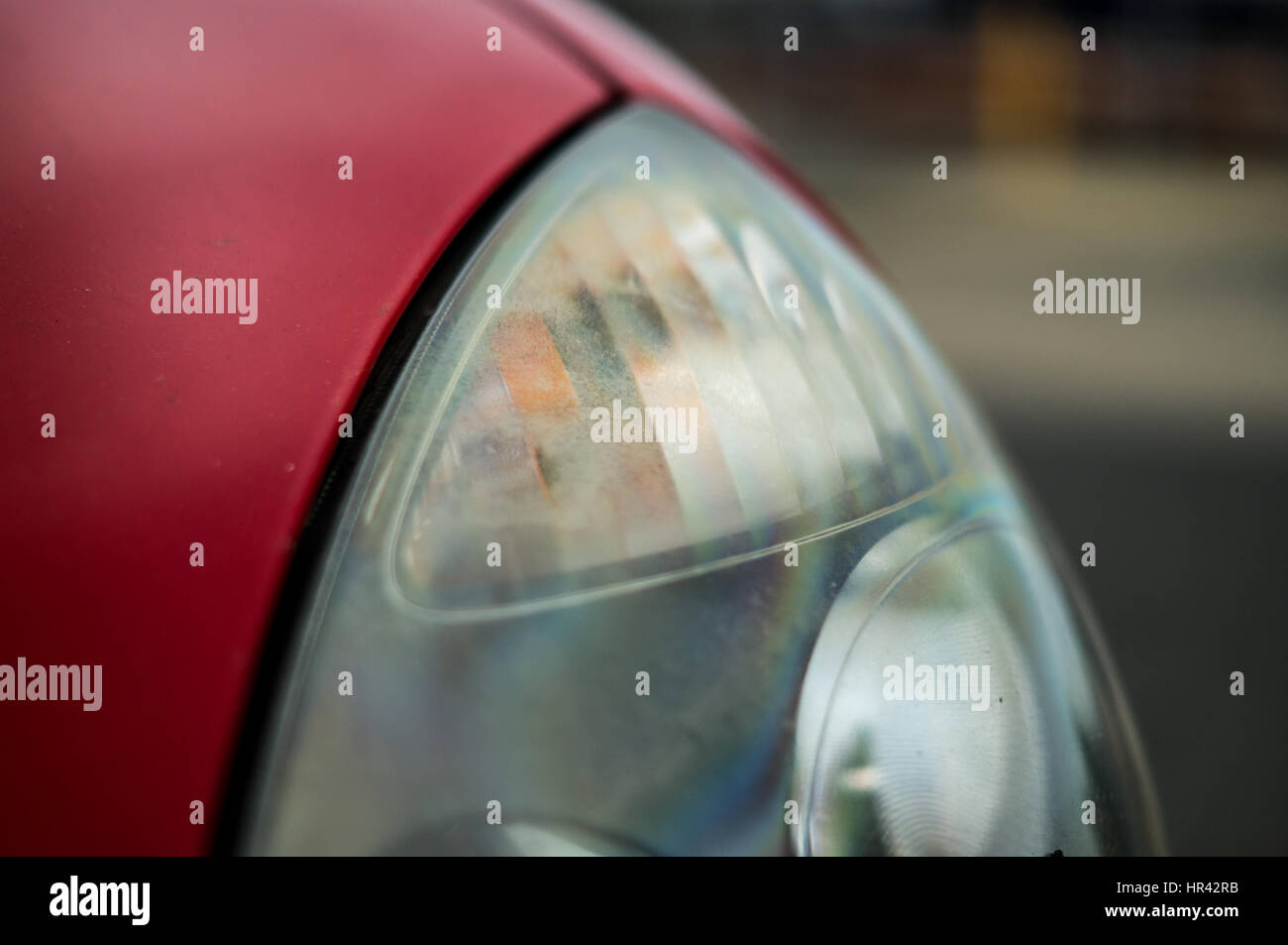 Faded, glazed sunlight damaged headlight headlamp that needs restoring ...