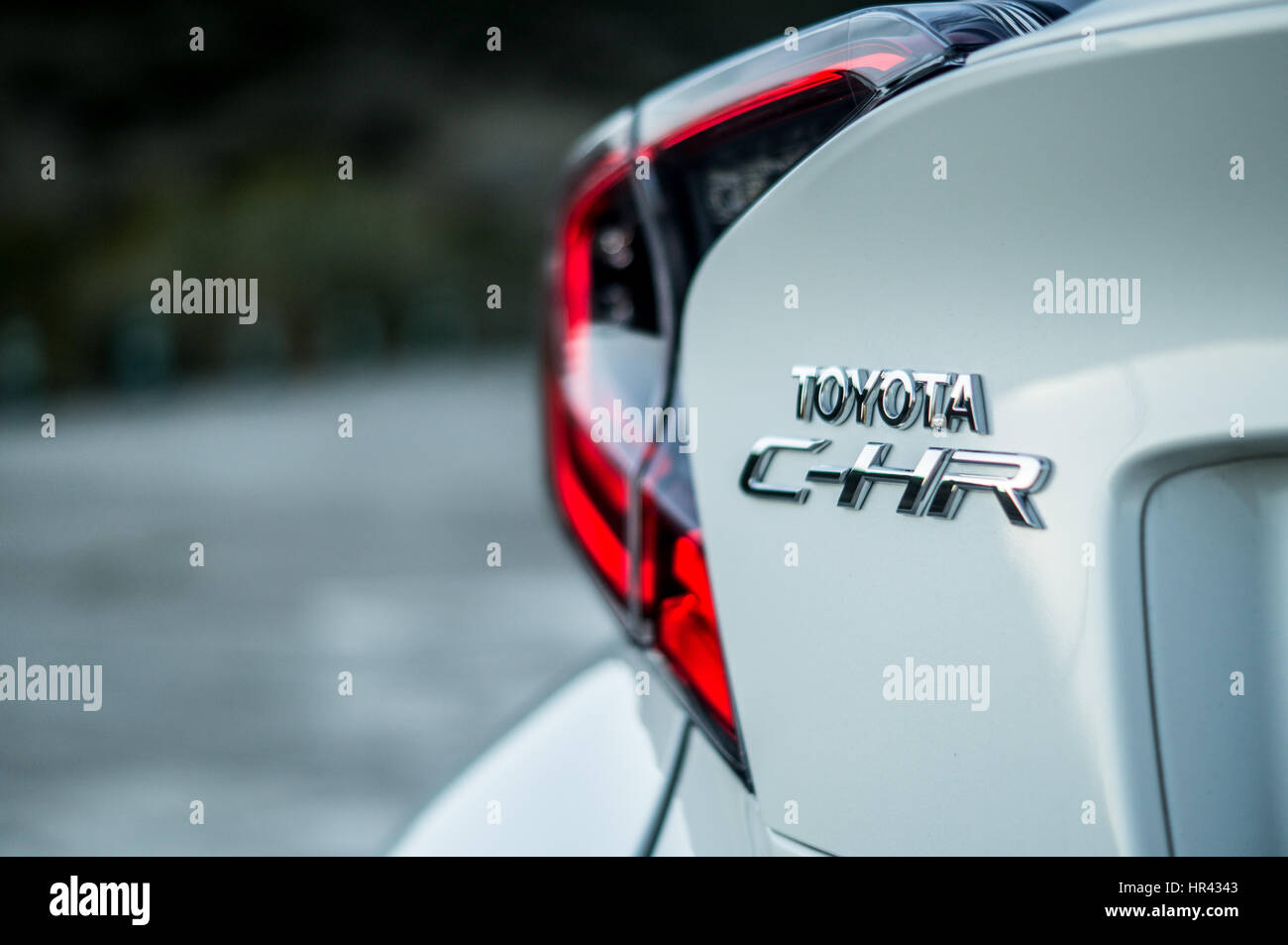 White Toyota C-HR CHR rear badge Stock Photo - Alamy