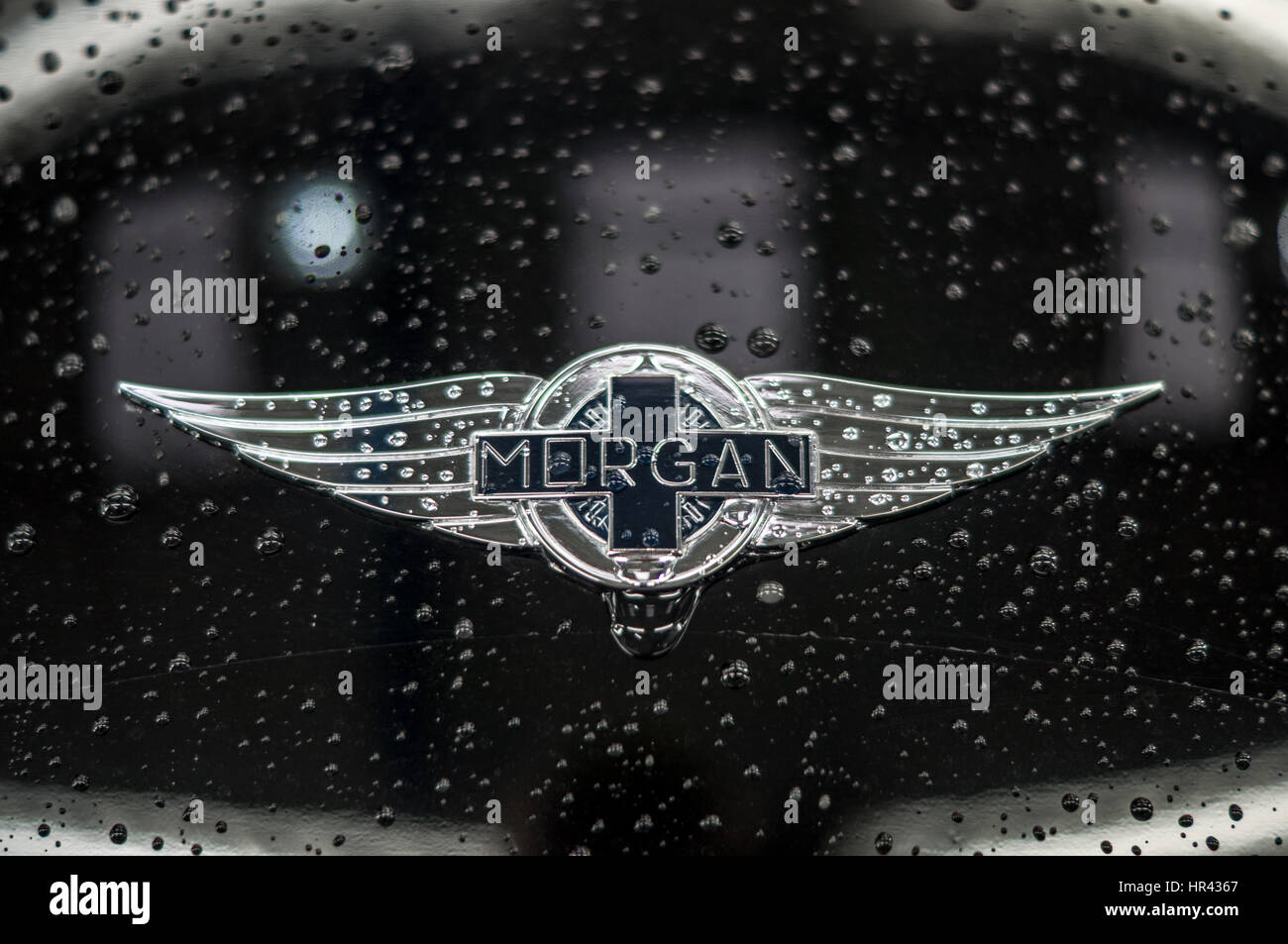 Morgan Motor Cars badge emblem wet with rain Stock Photo - Alamy
