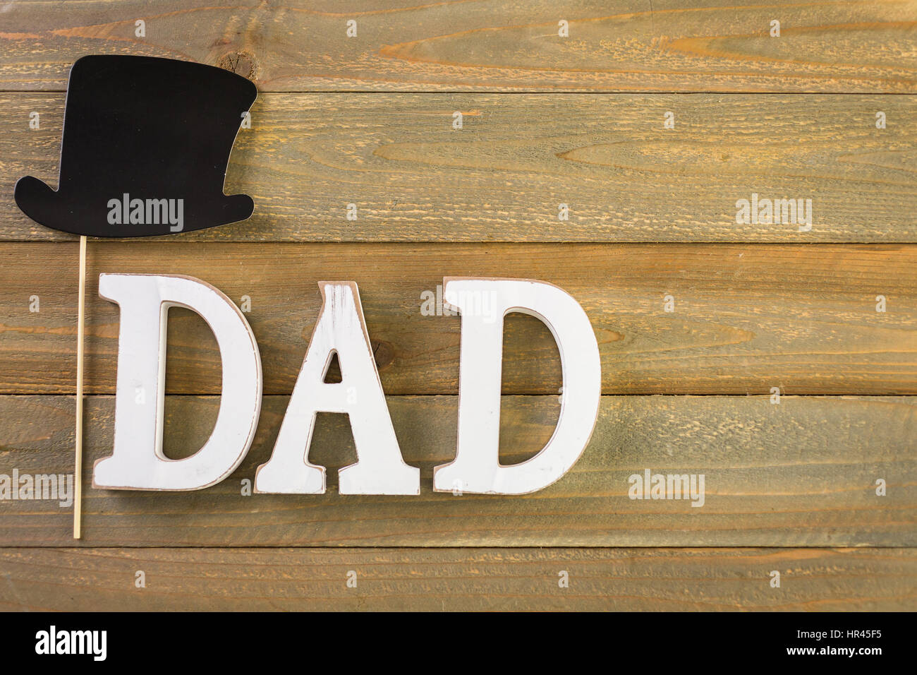 White letters DAD on a painted wood background Stock Photo - Alamy