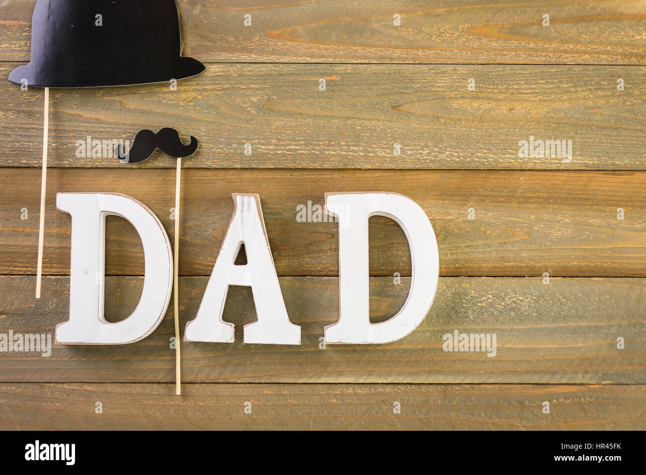 White letters DAD on a painted wood background Stock Photo - Alamy