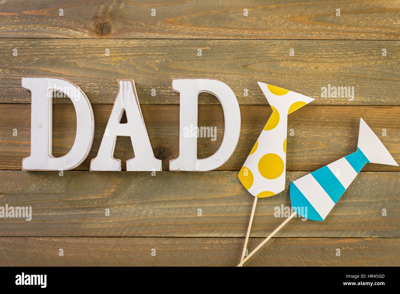 White letters DAD on a painted wood background Stock Photo - Alamy