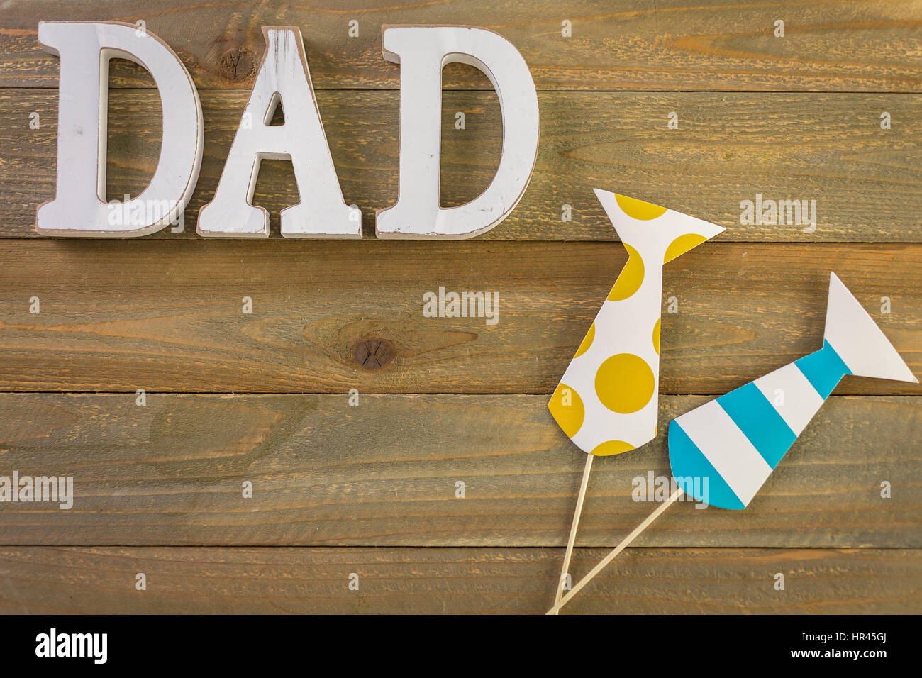 White letters DAD on a painted wood background Stock Photo - Alamy