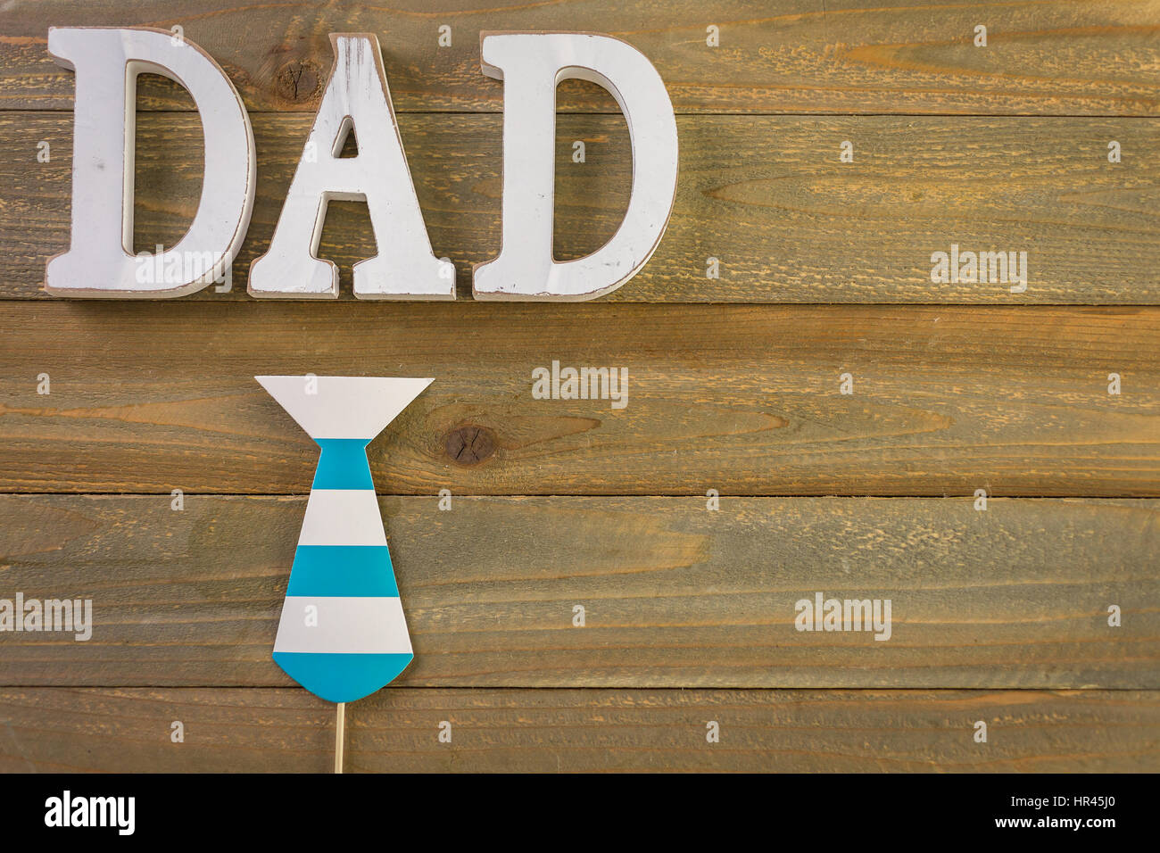 White letters DAD on a painted wood background Stock Photo - Alamy