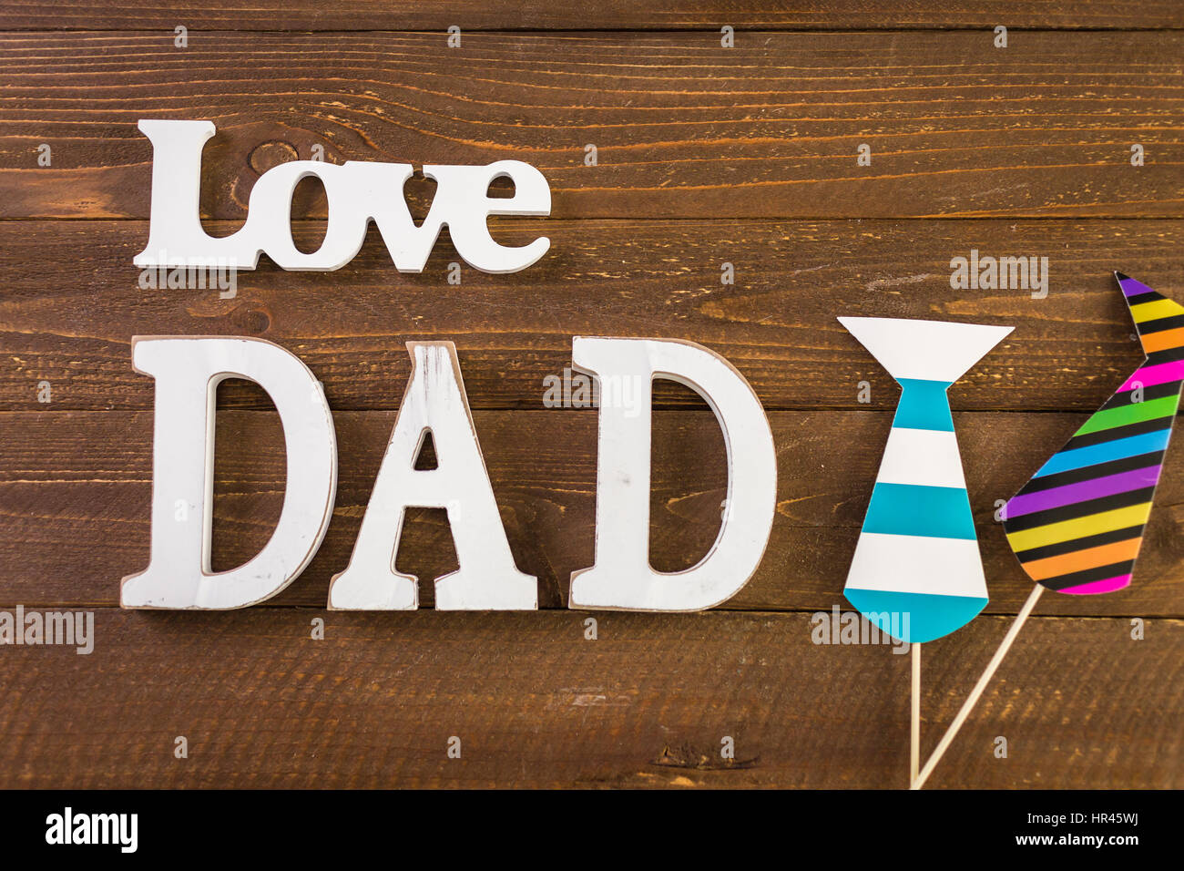 White letters DAD on a painted wood background Stock Photo - Alamy
