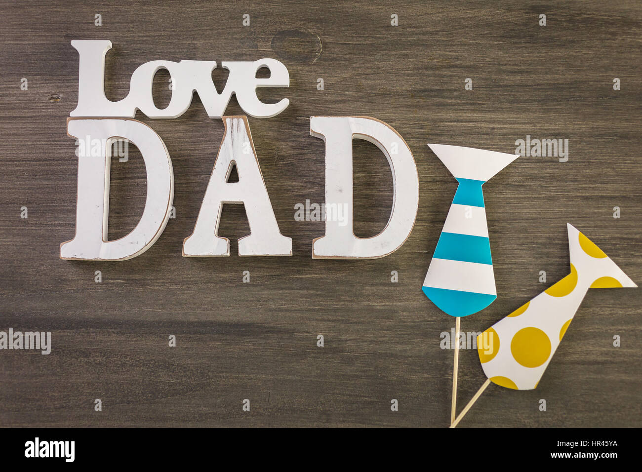 White letters DAD on a painted wood background Stock Photo - Alamy