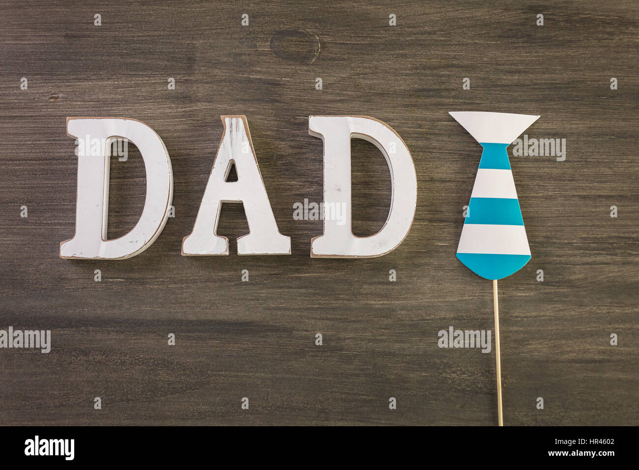 White letters DAD on a painted wood background Stock Photo - Alamy