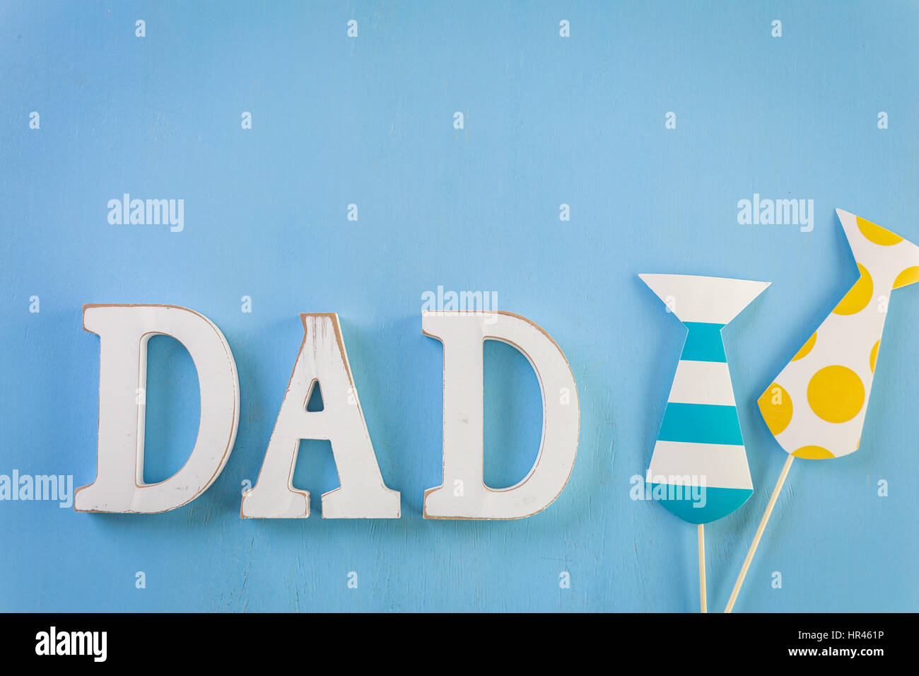 White letters DAD on a painted wood background Stock Photo - Alamy